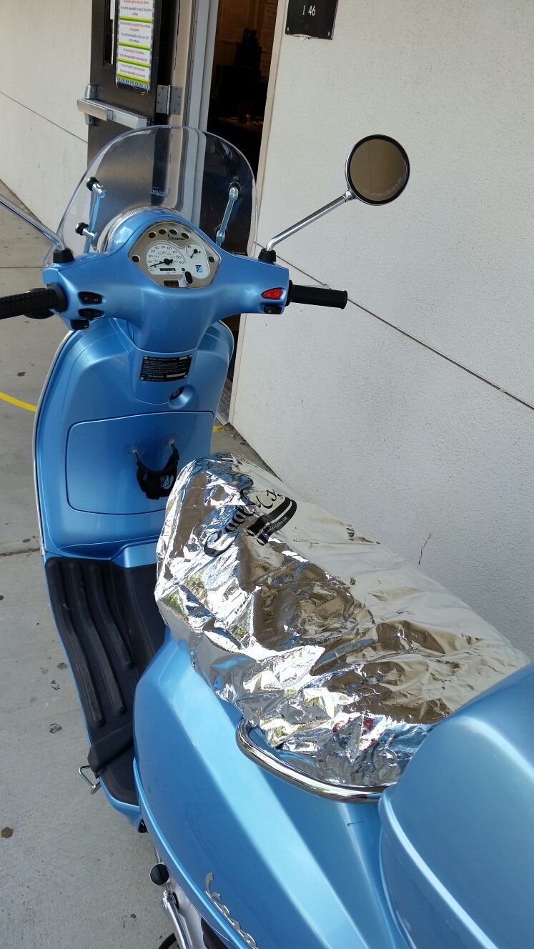 Modern Vespa : Wet Scooter and Rain Covers