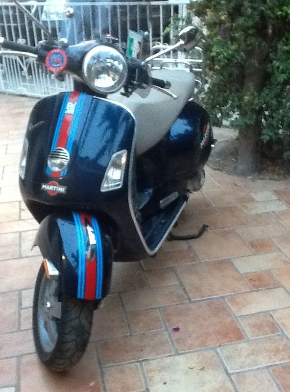 Modern Vespa : Martini race team stripes and driving route recommendations