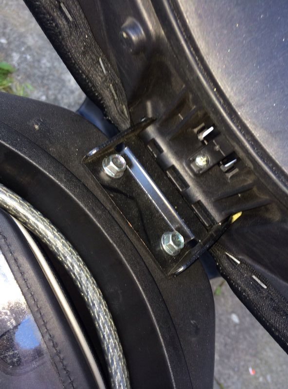 Modern Vespa : Spring loaded seat.